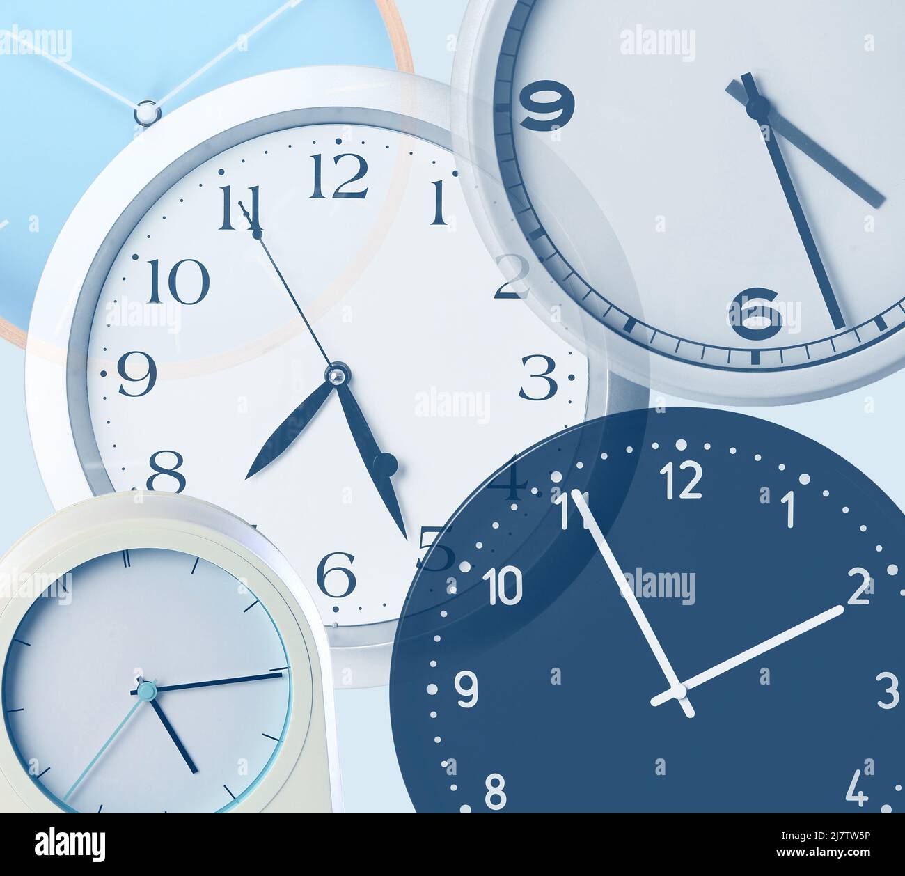 Collage with many different clocks on light background Stock Photo - Alamy