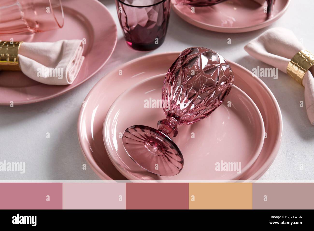 Stylish table setting in pink colors. Different color patterns Stock ...