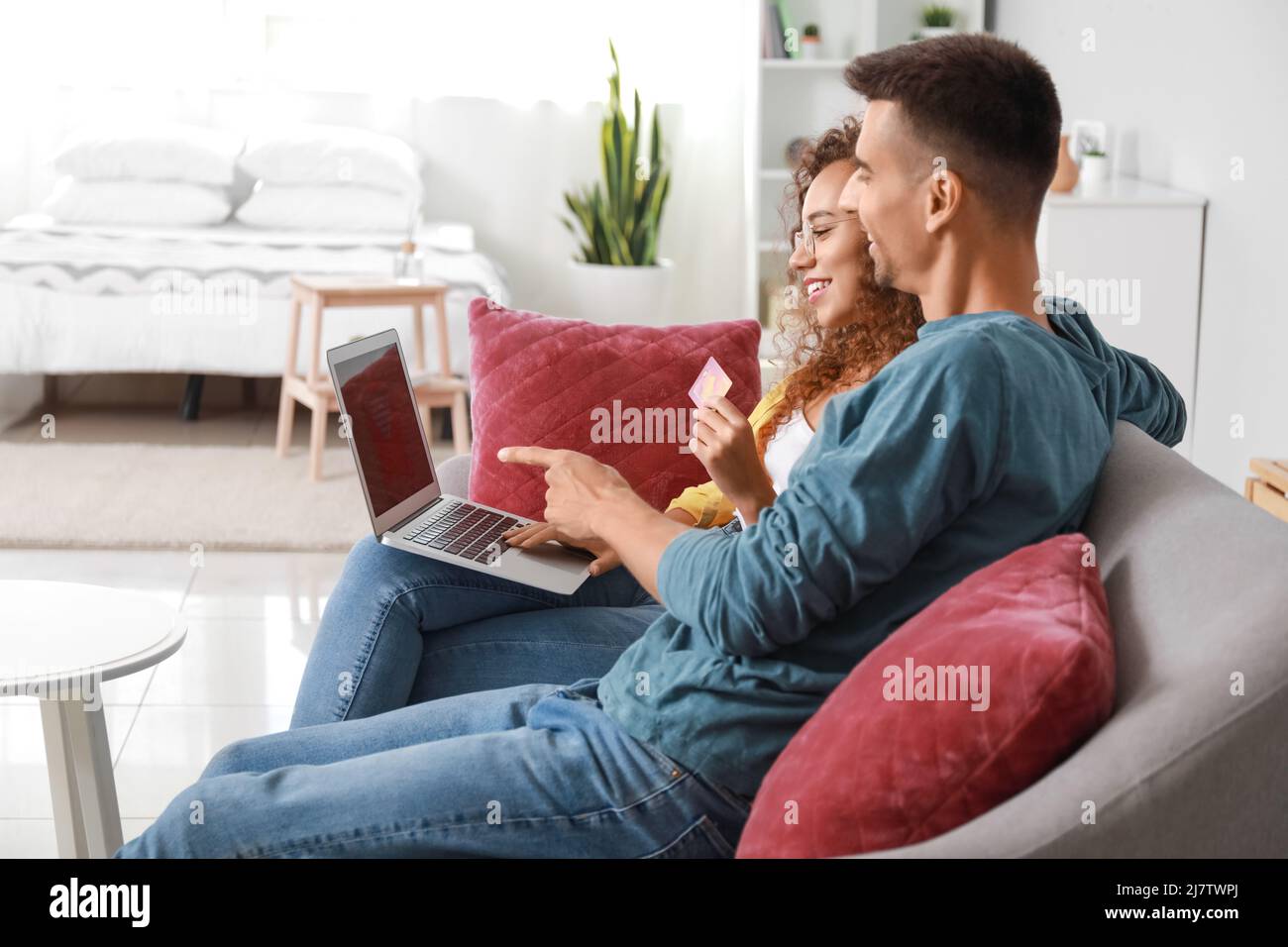 Woman buying something online using hi-res stock photography and images ...