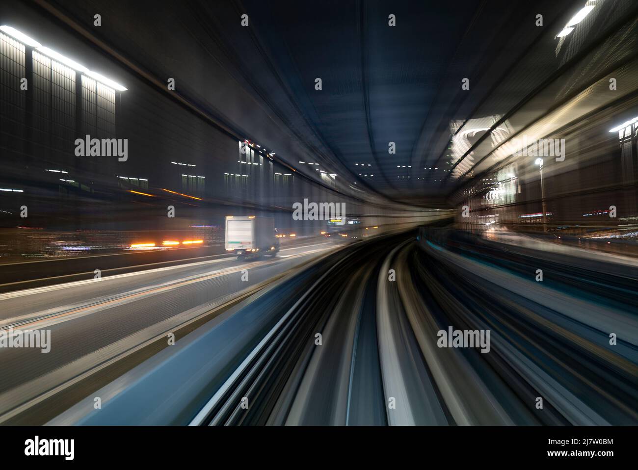 The Yurikamome subway in Tokyo at Night Stock Photo - Alamy