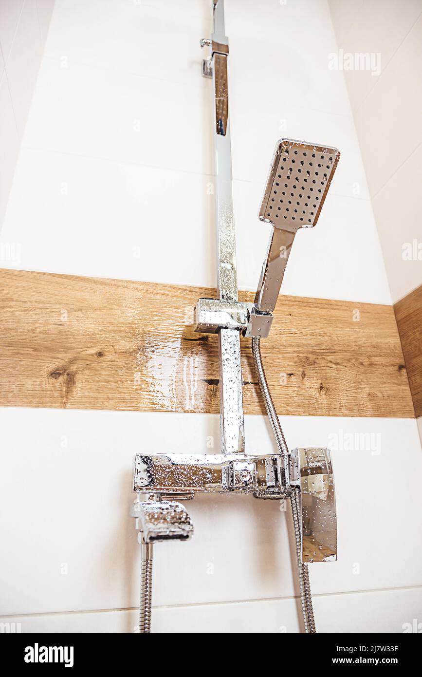 shower head with wall background in modern bathroom, vertical photo ...