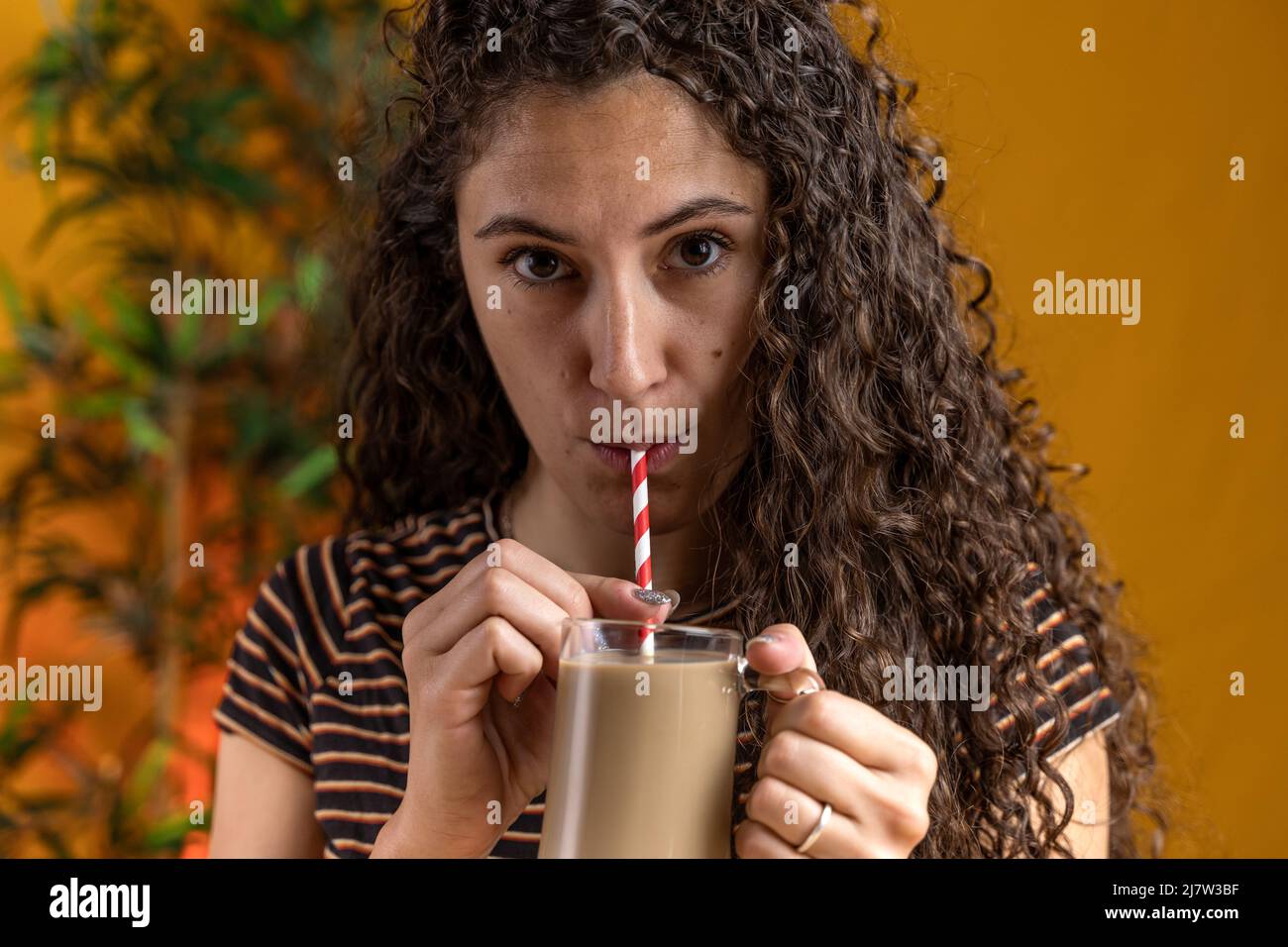 Sucking through straw hi-res stock photography and images - Alamy