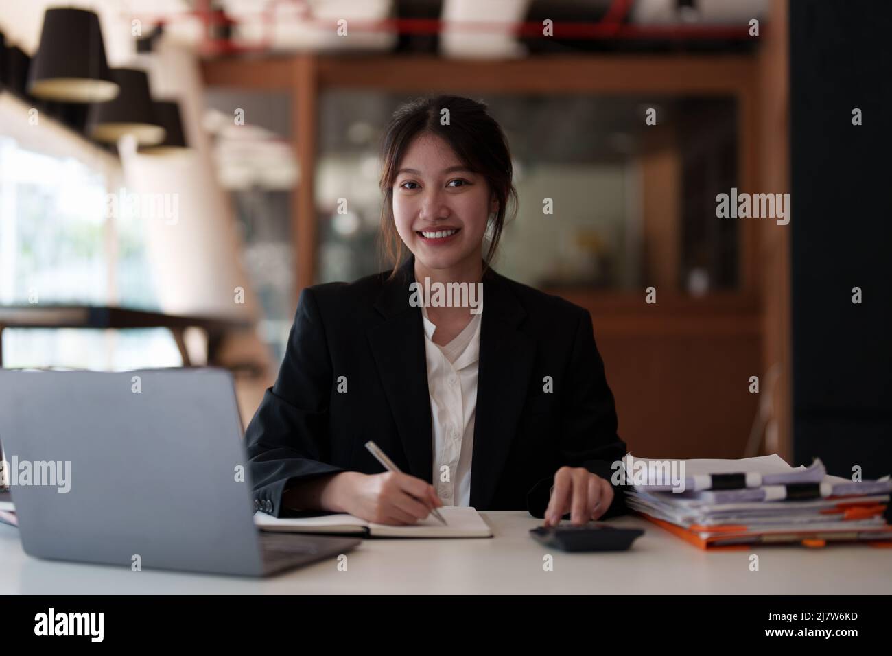 Modern Asian Business woman have confident working with financial team ...