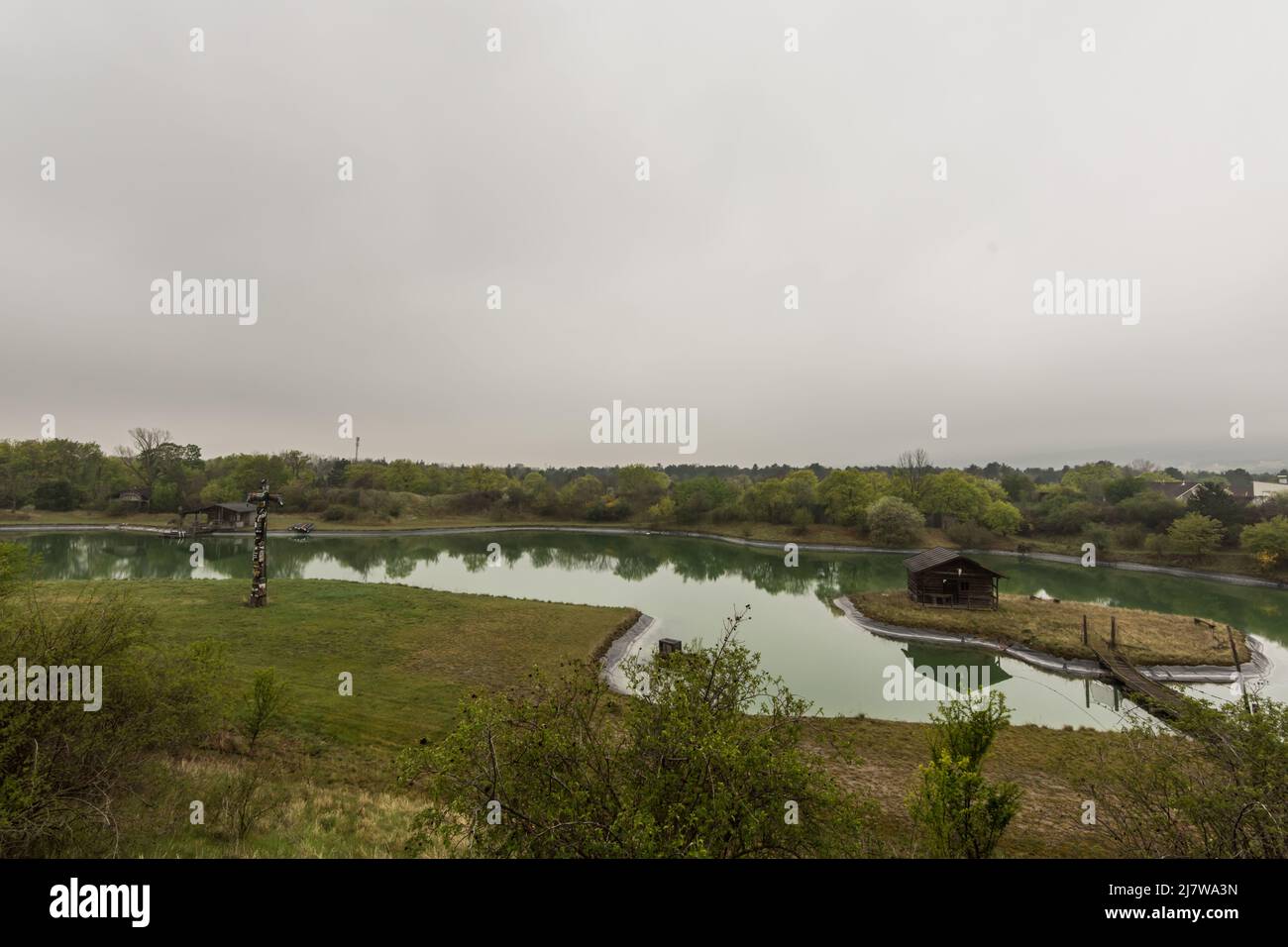 large areal with a pond and old wooden houses Stock Photo - Alamy