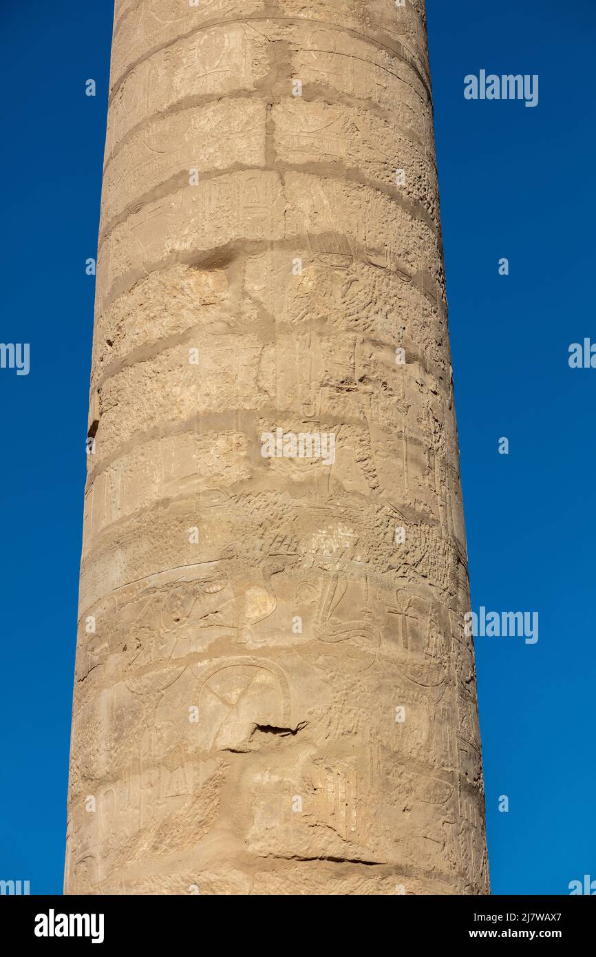 Different columns with hieroglyphs in Karnak temple. Karnak temple is ...