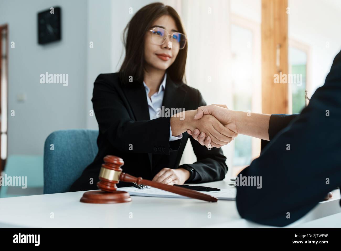 Judge lawyer shaking hands in hi-res stock photography and images - Alamy