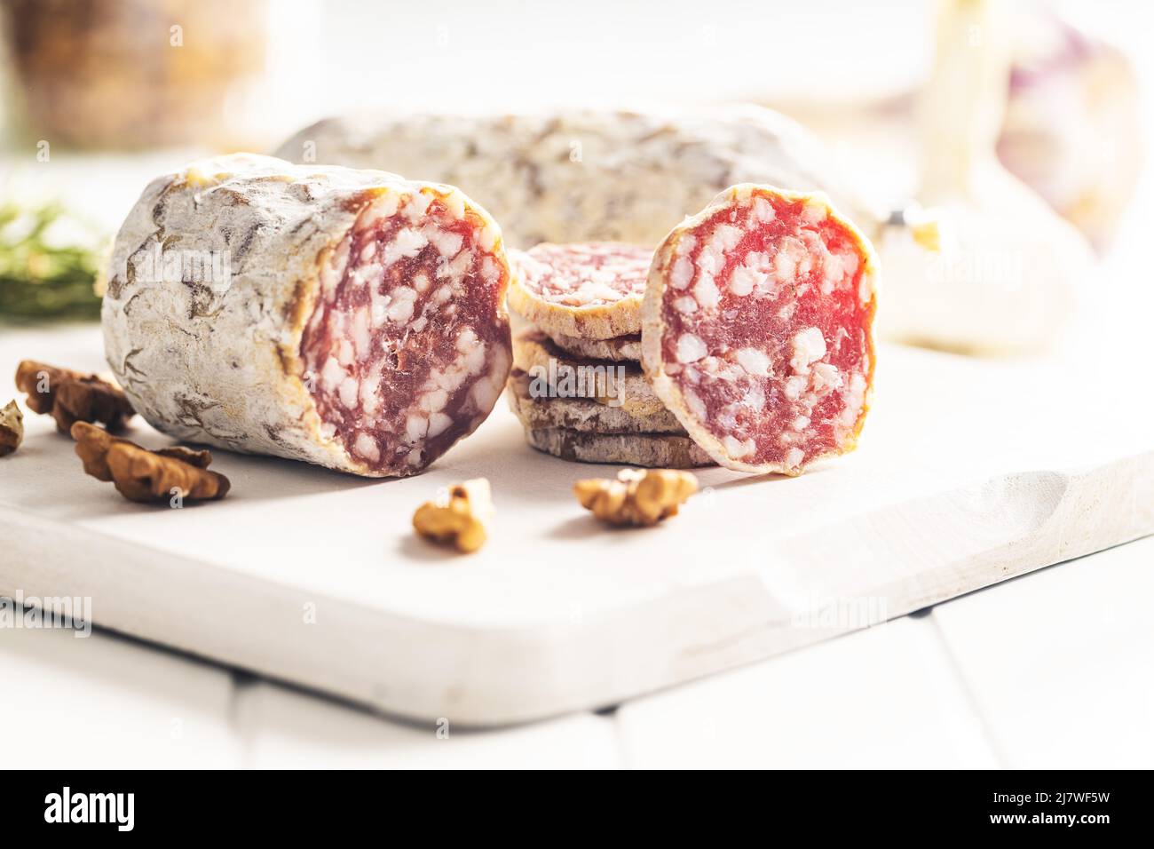 Traditional sausage with white mold. Dried sliced pork salami on a ...