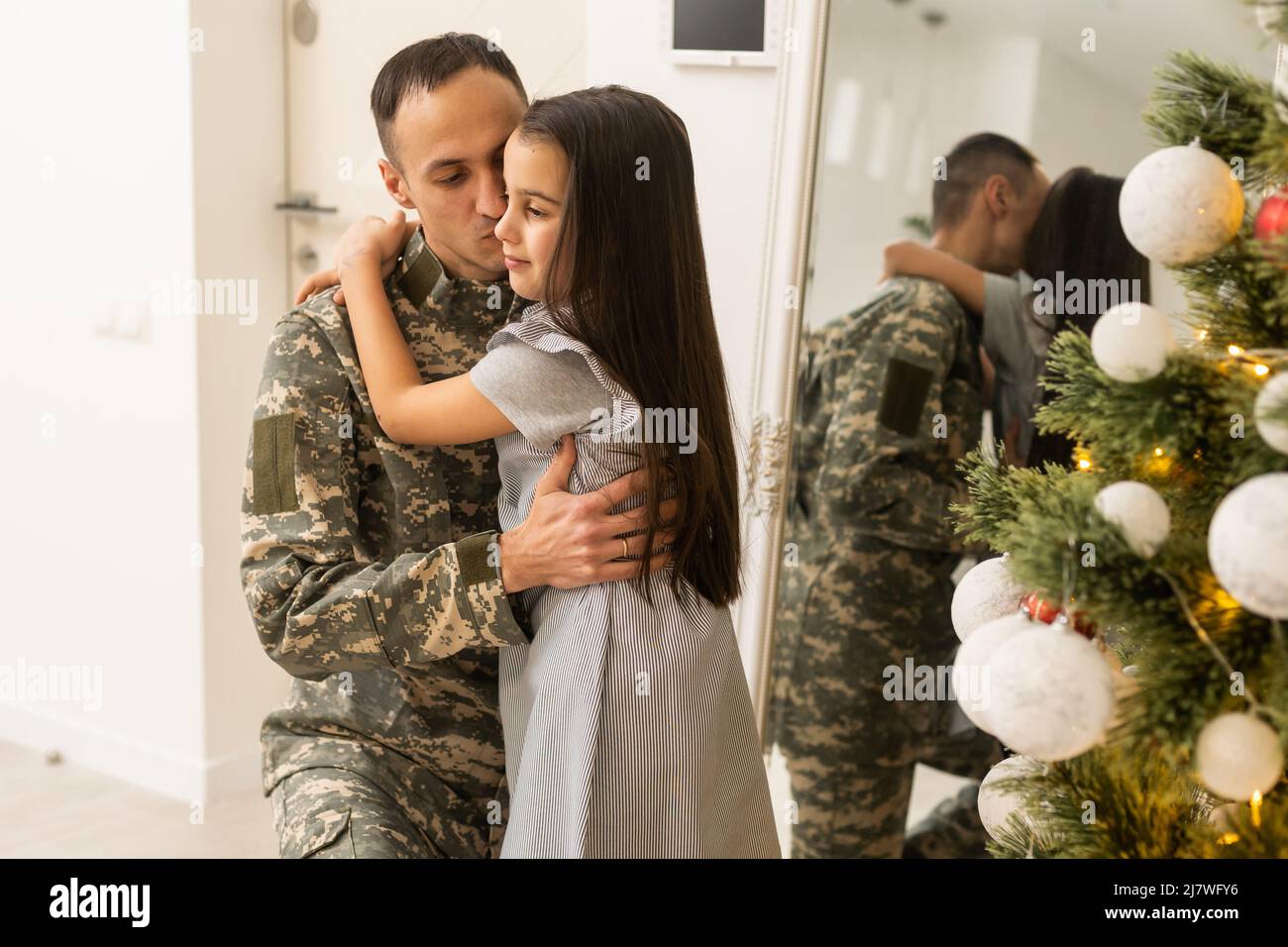 Military Man and his daughter for christmas Stock Photo - Alamy