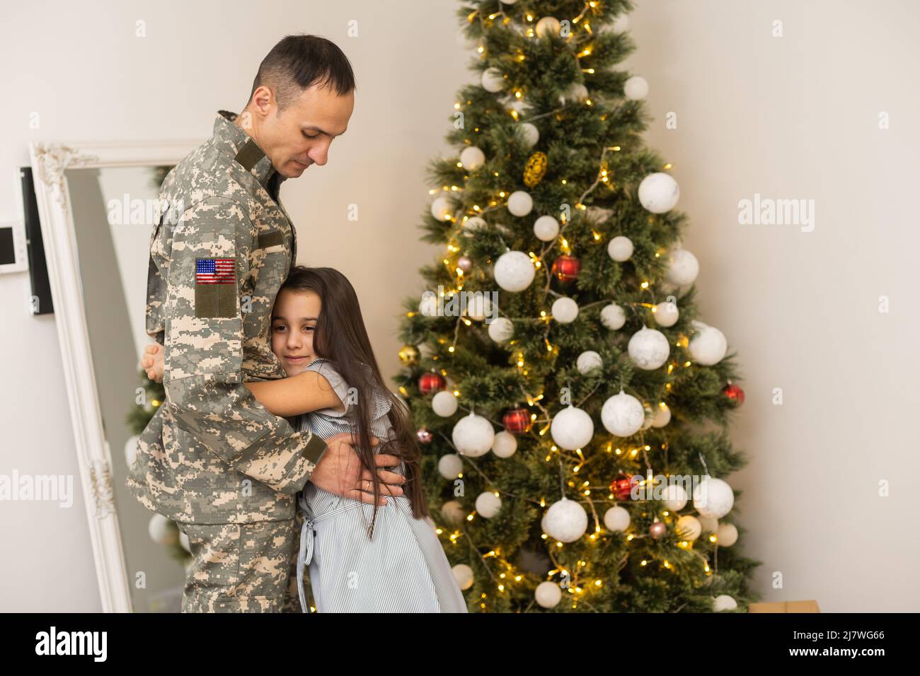 Military Man and his daughter for christmas Stock Photo - Alamy