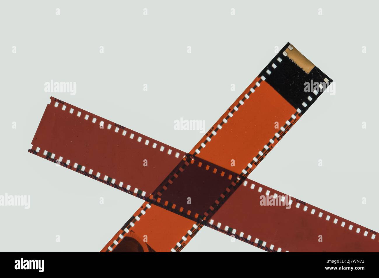 Two empty color 35mm film with scratches, cracks, dust, negative ...