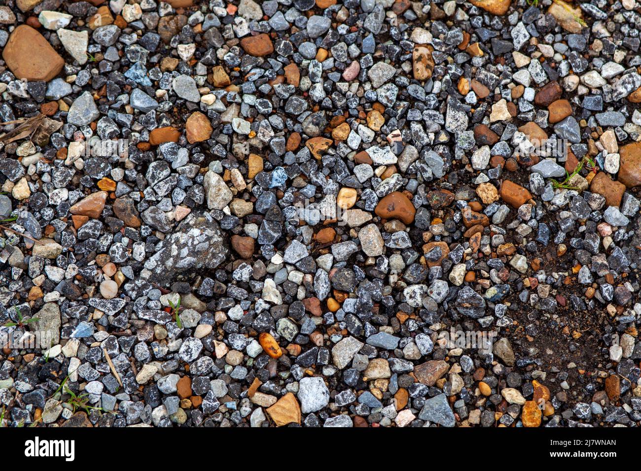 Rocks from a degrading old pavement road Stock Photo - Alamy