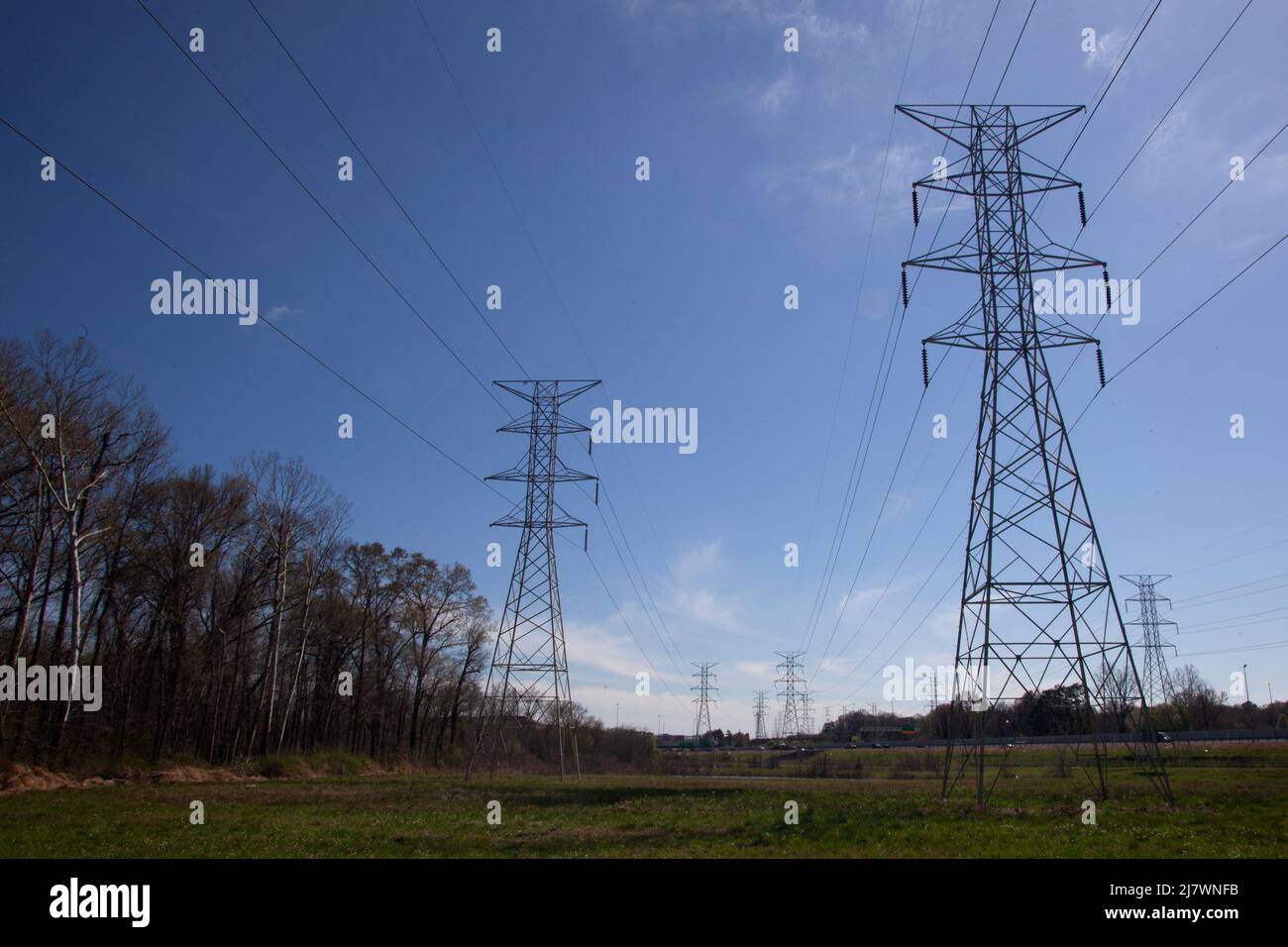 Power Lines with blue sky Stock Photo - Alamy