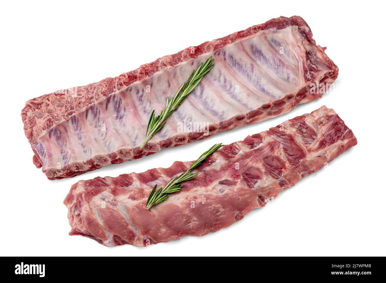 Raw Pork ribs with rosemary isolated on white. Raw pork ribs served ...