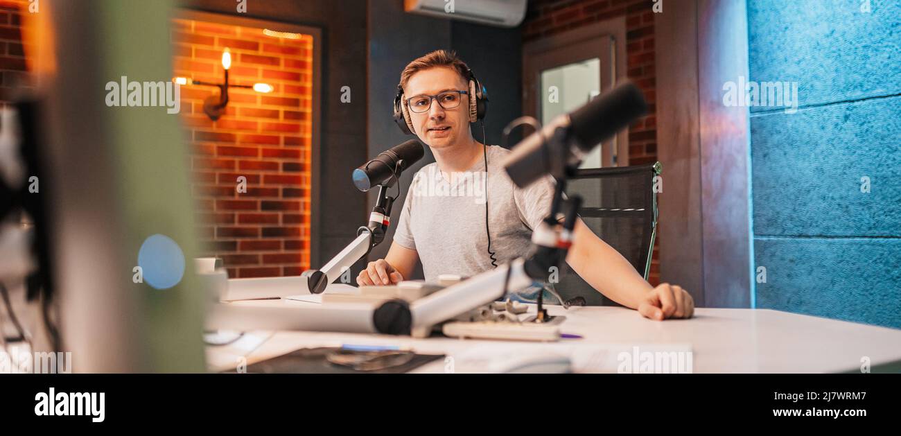 The DJ hosts the program and communicates with the audience on air at ...