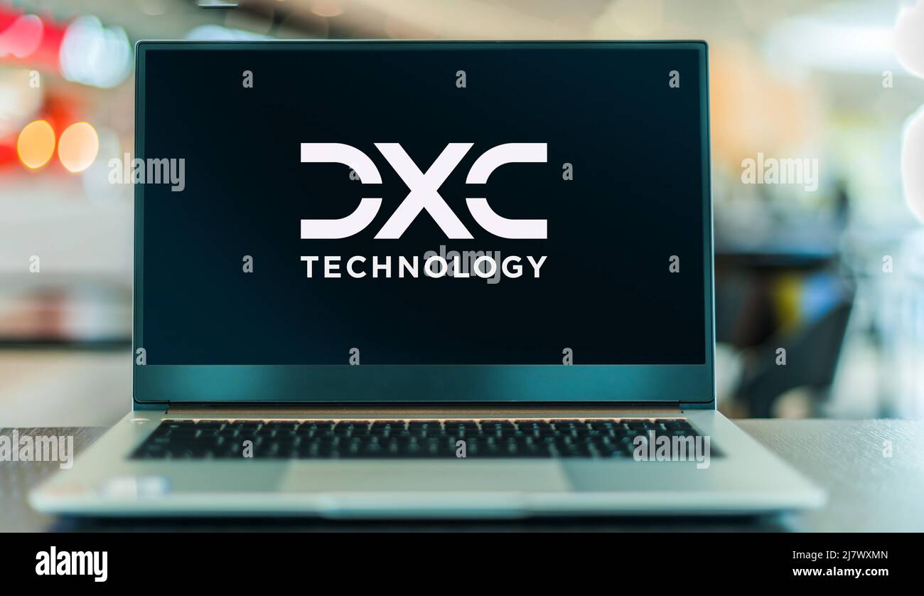 POZNAN, POL - OCT 1, 2021: Laptop computer displaying logo of DXC ...