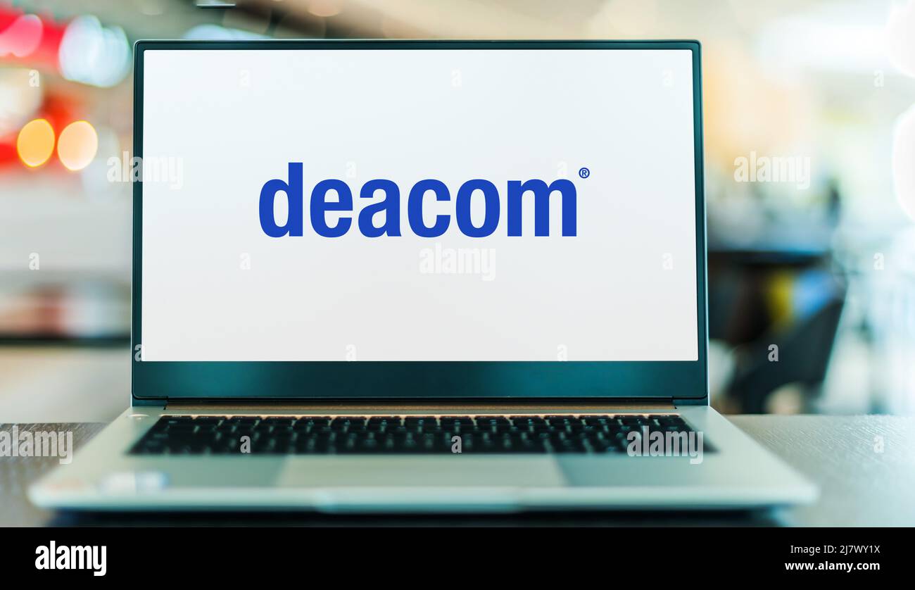 POZNAN, POL - DEC 8, 2021: Laptop computer displaying logo of Deacom ...