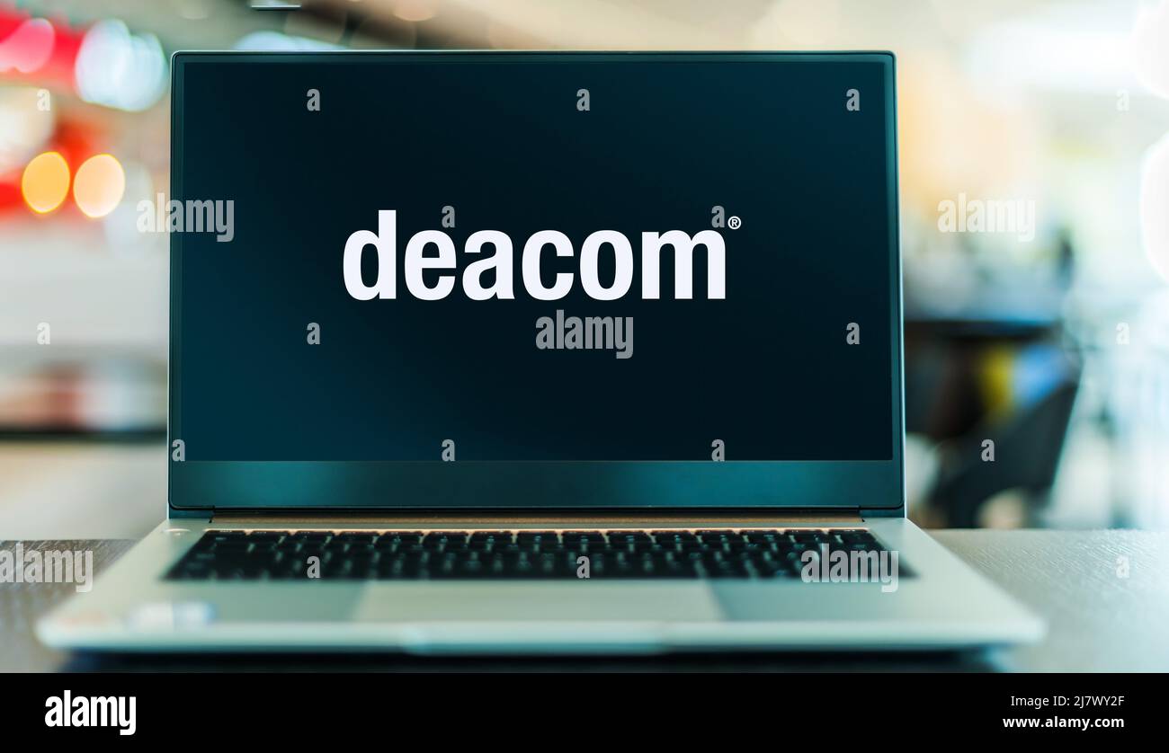POZNAN, POL - DEC 8, 2021: Laptop computer displaying logo of Deacom ...