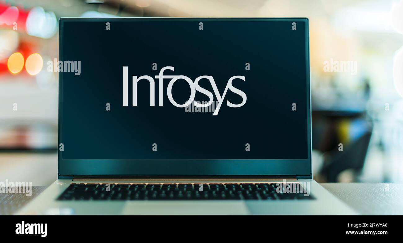 POZNAN, POL - APR 7, 2022: Laptop computer displaying logo of Infosys ...
