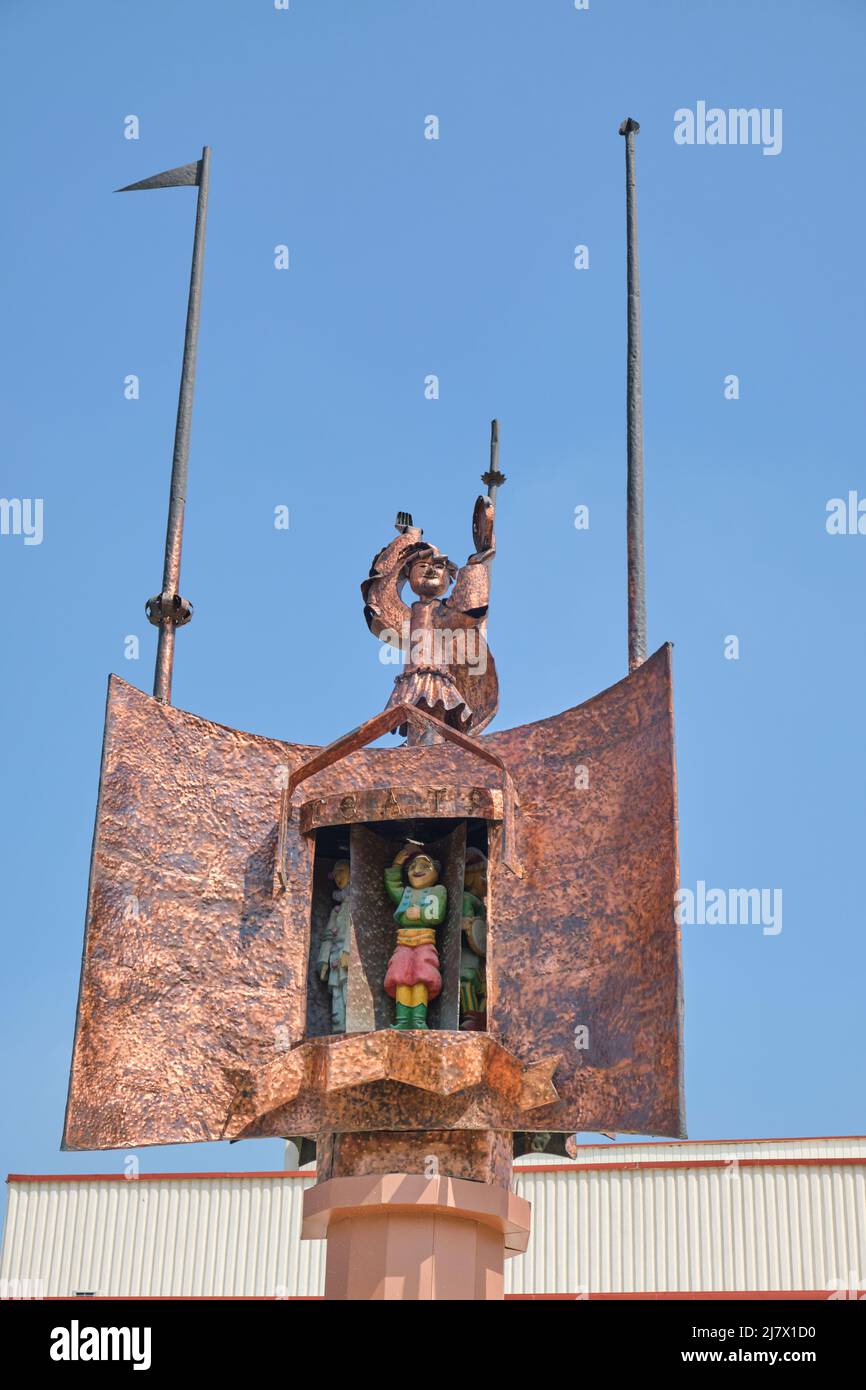 Detail of the metal sculpture out front, featuring a puppet. At the ...