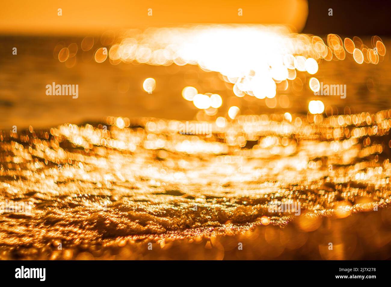 Abstract nature summer ocean sunset sea background. Small waves on ...