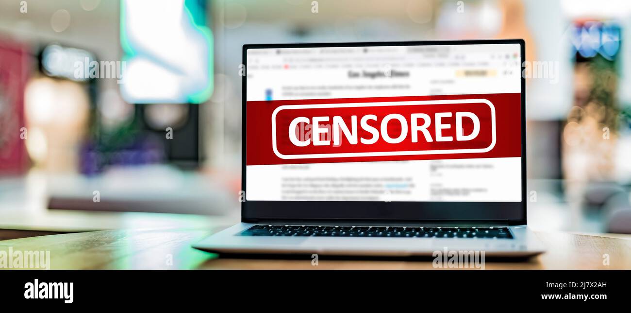 Laptop computer displaying the sign of censorship on an internet news ...