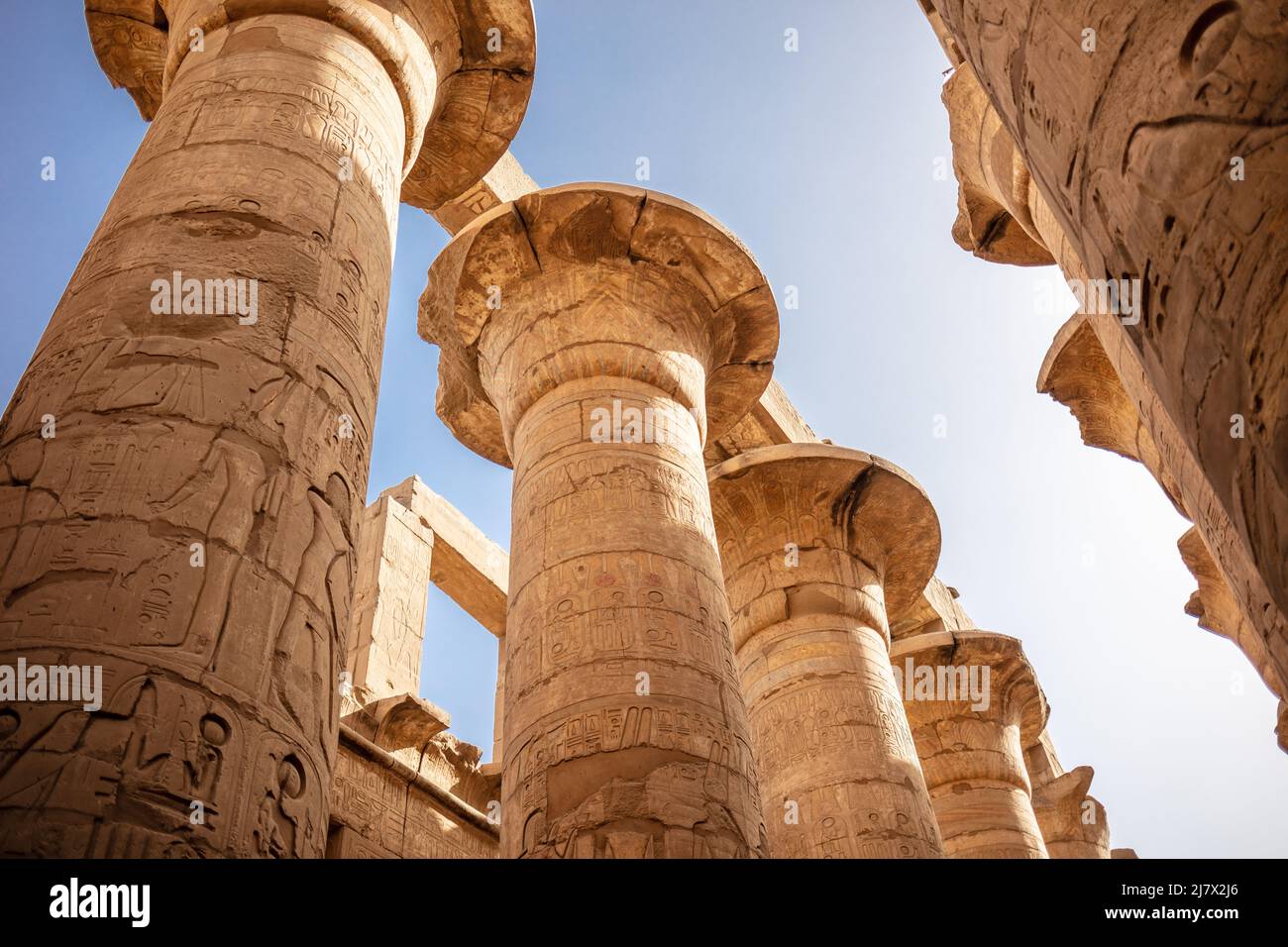 Different columns with hieroglyphs in Karnak temple. Karnak temple is the largest complex in ...