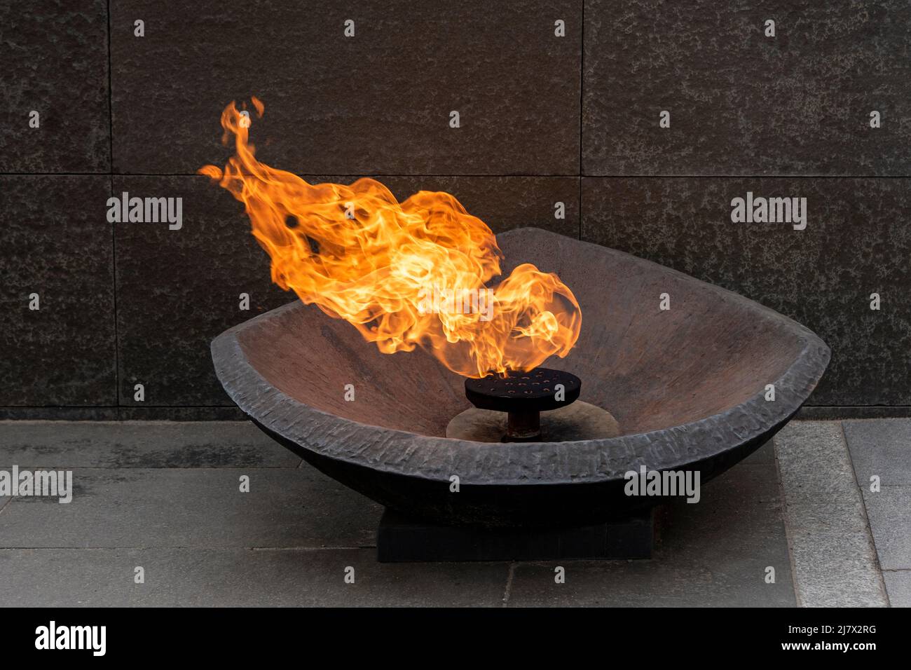 Burning eternal flame monument, memory of war symbol Stock Photo - Alamy