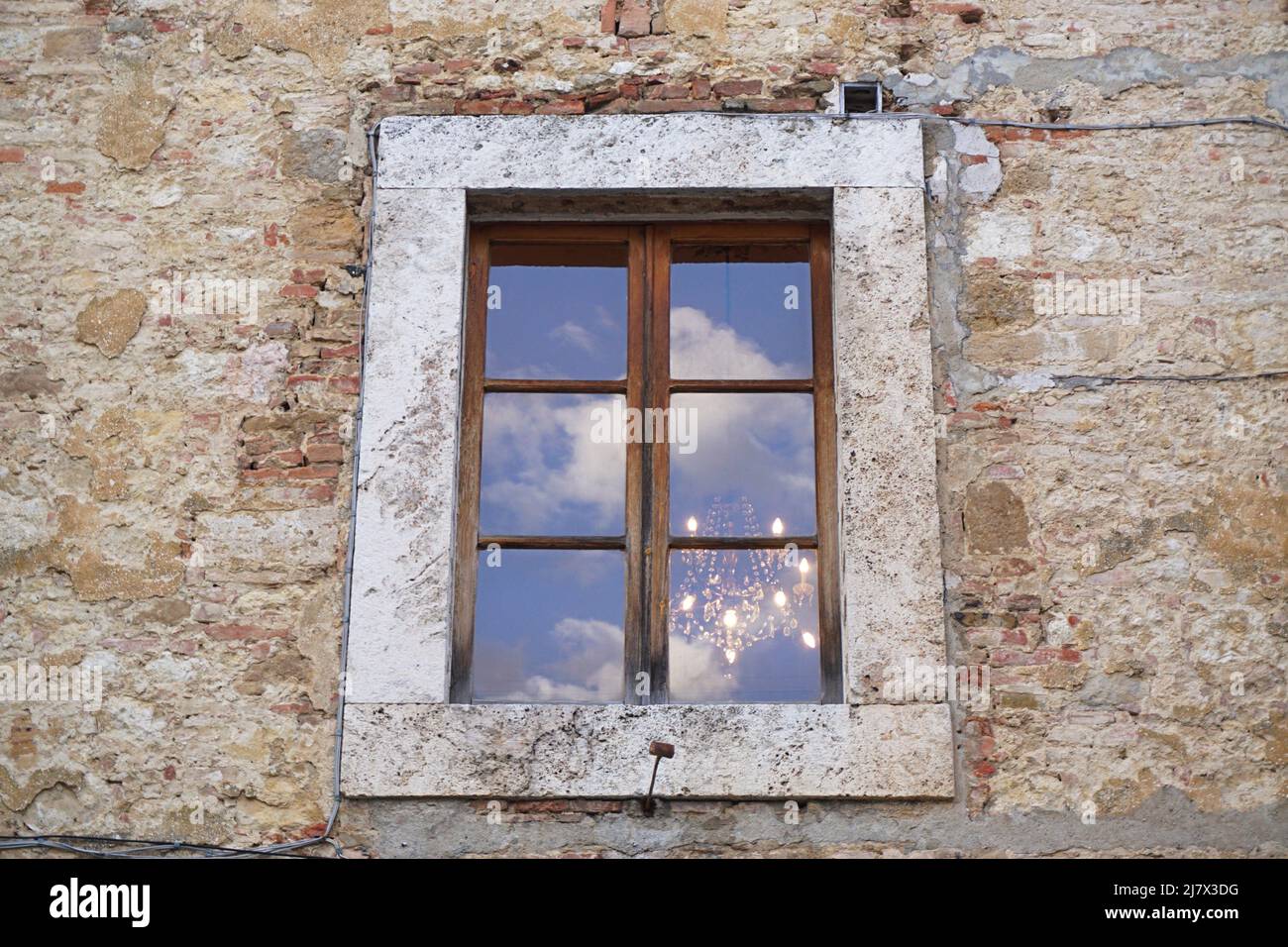 Peeking through a window and spotting a beautiful chandelier and the ...