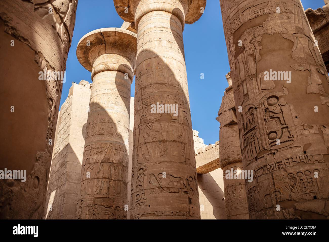 Different columns with hieroglyphs in Karnak temple. Karnak temple is the largest complex in ...