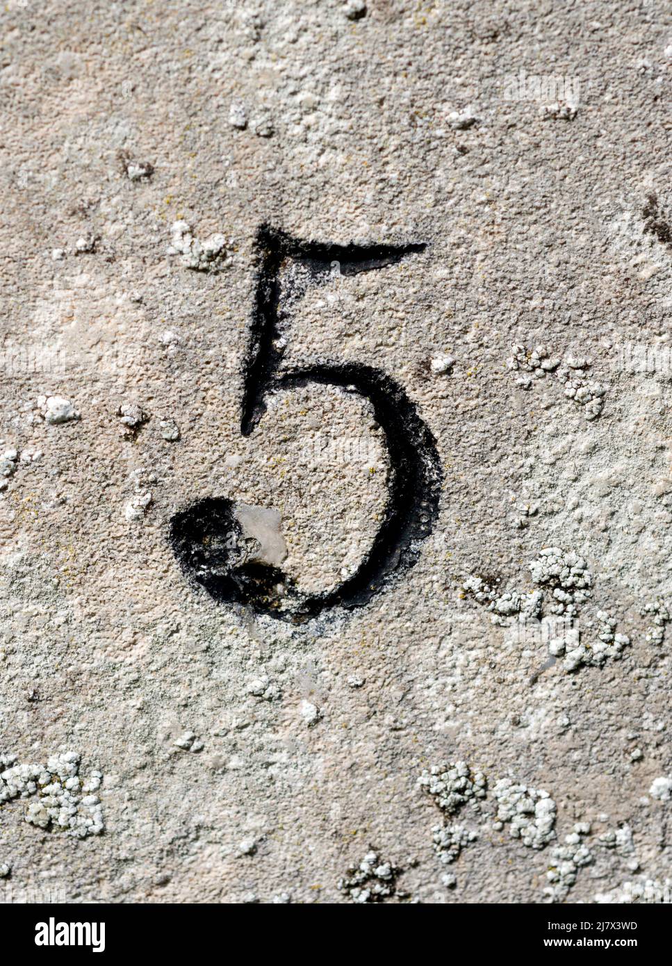 The number 5 on a gravestone Stock Photo - Alamy