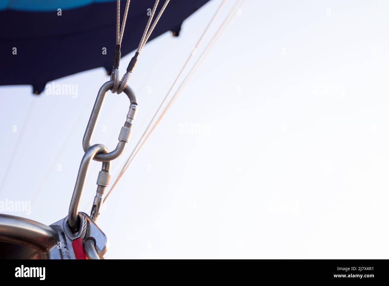 Carabiner and hot air balloon rope Stock Photo - Alamy