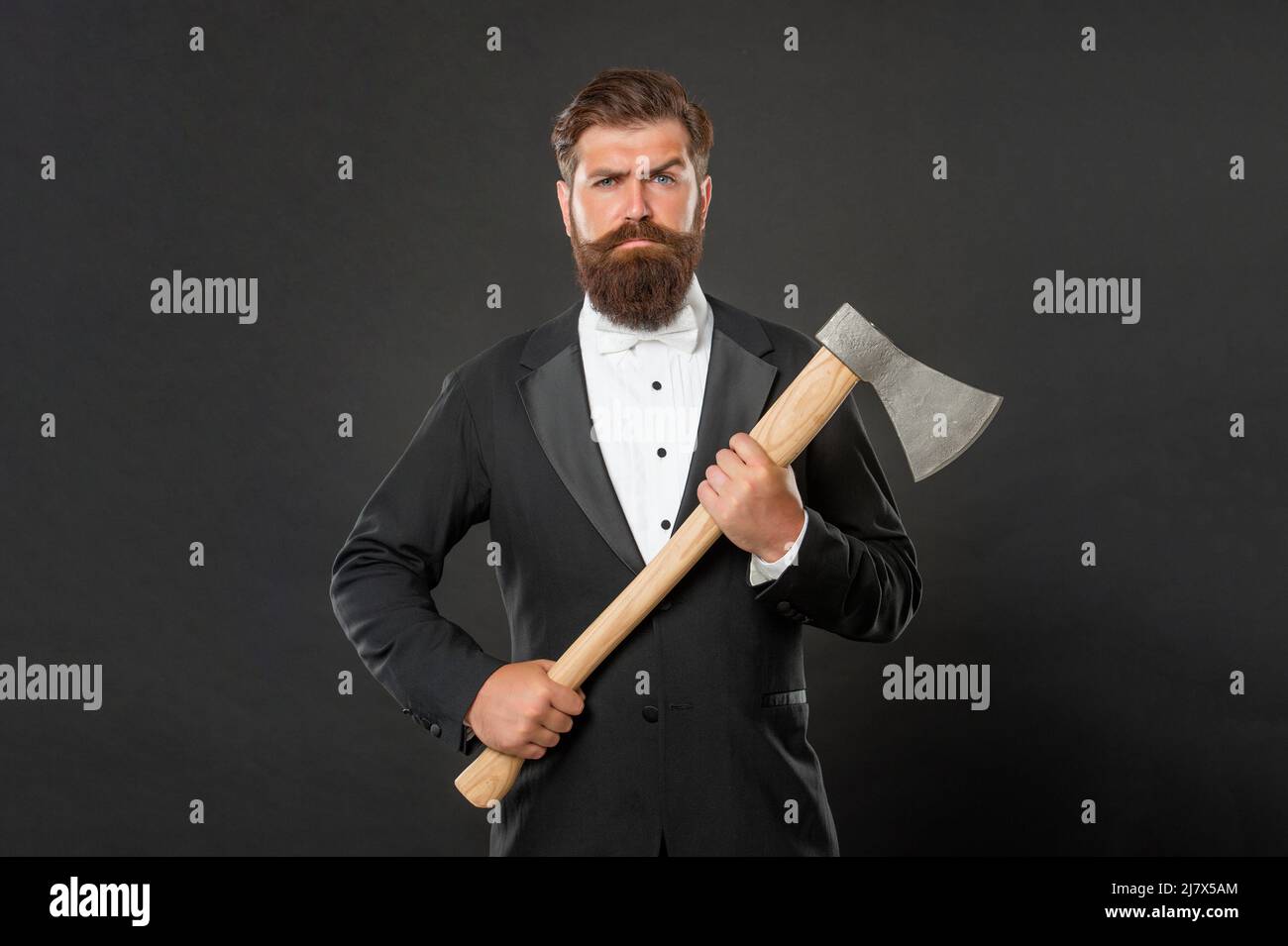 Theres a beard style for every man. Bearded man holding hatchet ...