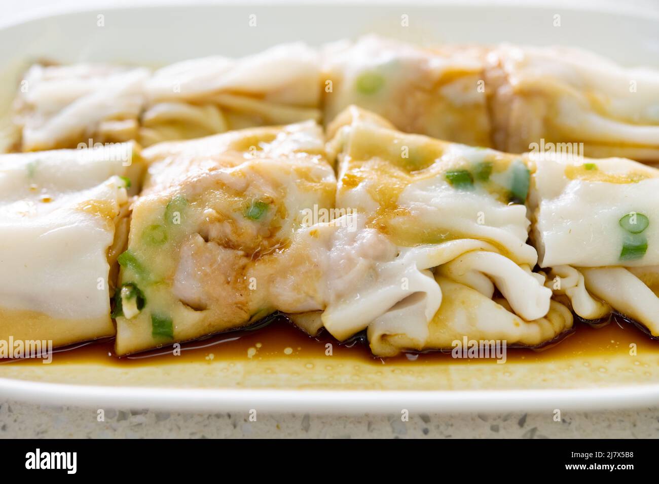 angle view traditonal Cantonese food of cheong fun or rice noodle rolls ...