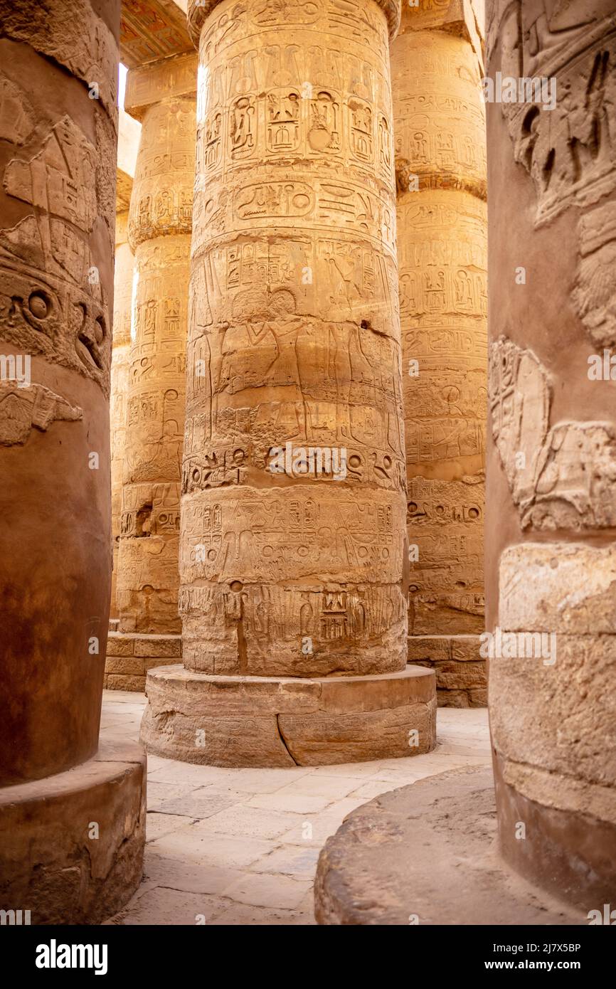Different columns with hieroglyphs in Karnak temple. Karnak temple is the largest complex in ...