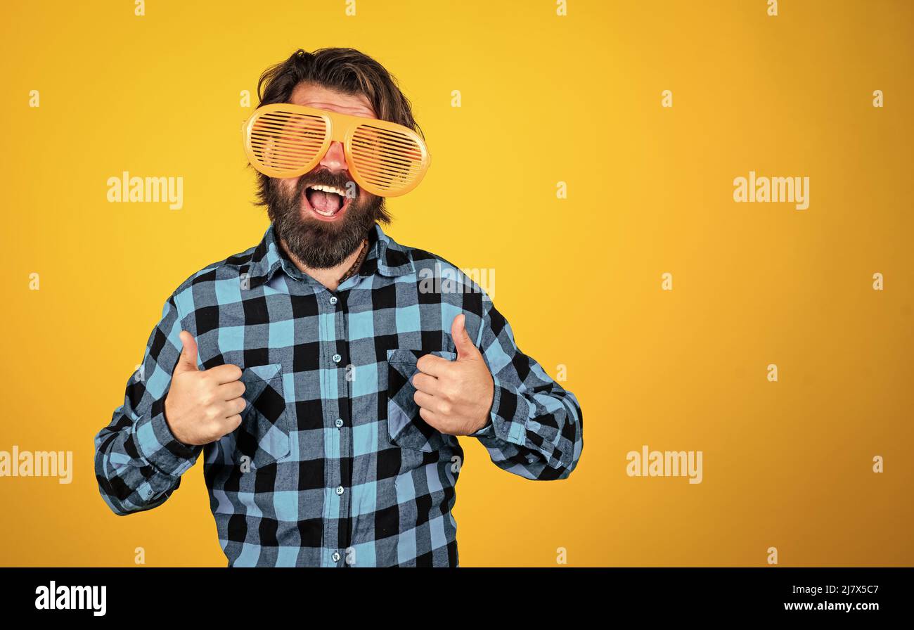 brutal guy wear checkered shirt. male with moustache having fun ...