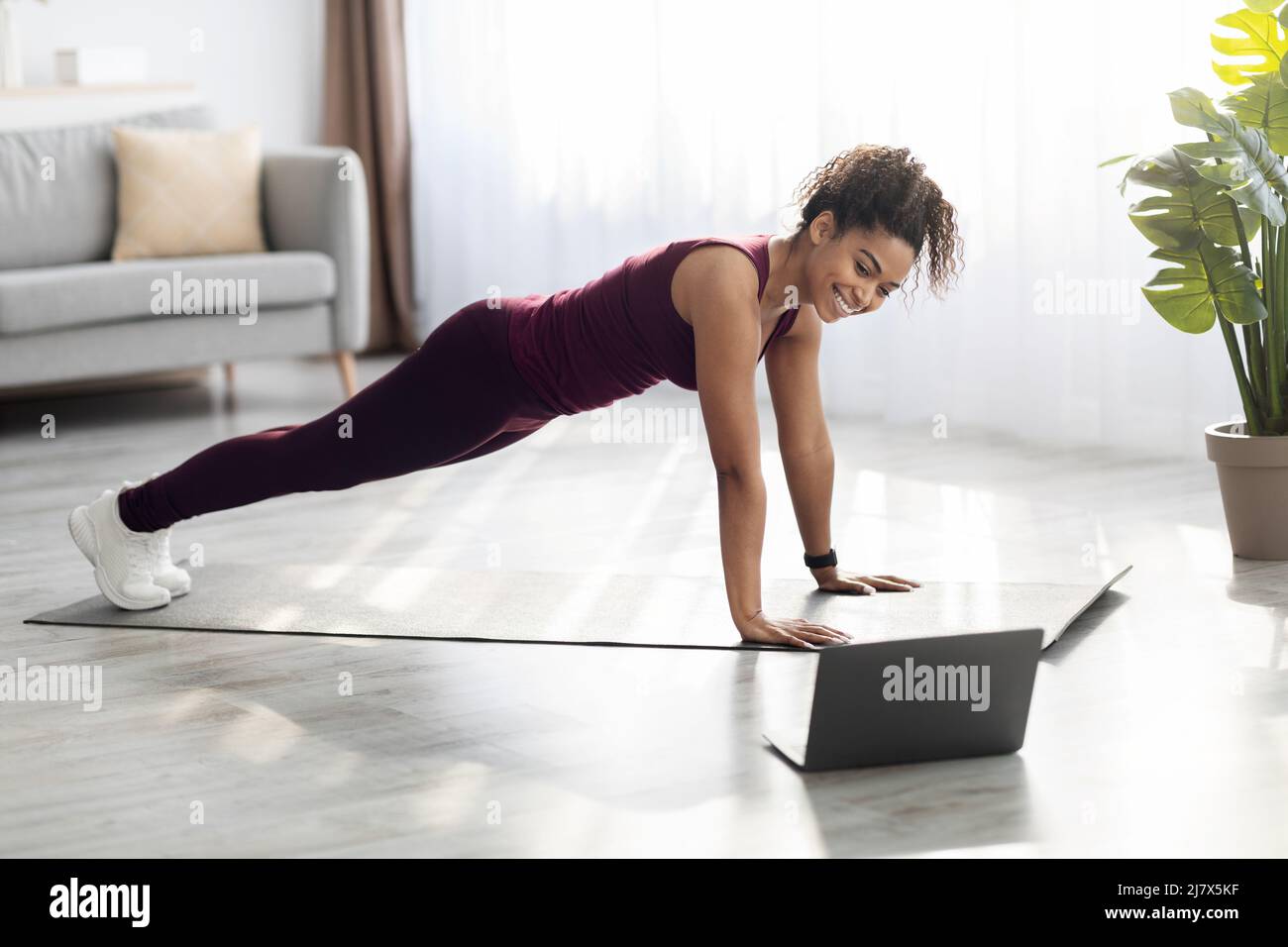 Body positive black female exercising hi-res stock photography and ...