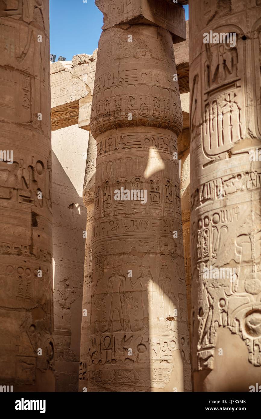Different columns with hieroglyphs in Karnak temple. Karnak temple is the largest complex in ...