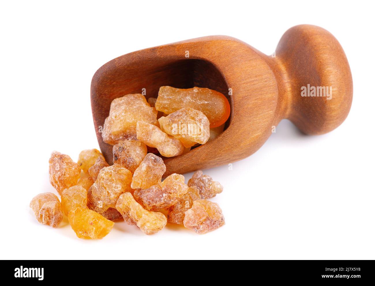 Frankincense resin in wooden scoop, isolated on white background. Pile ...