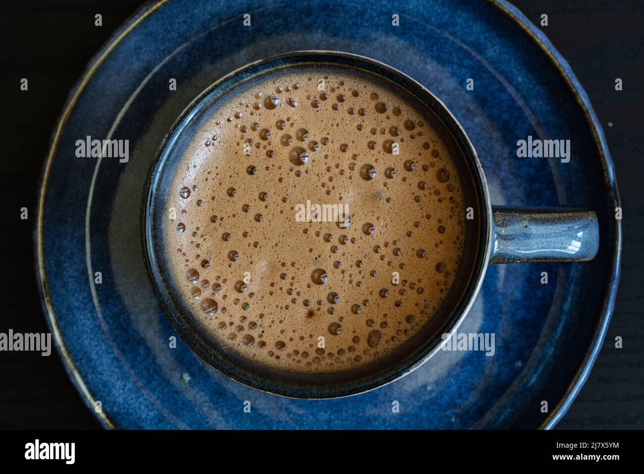 blue cup of coffee on black background for design purpose Stock Photo ...