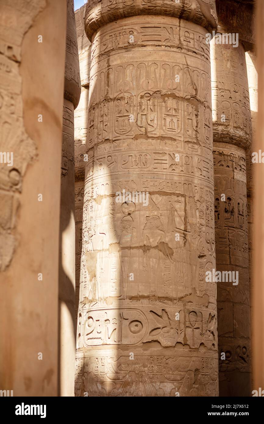 Different columns with hieroglyphs in Karnak temple. Karnak temple is the largest complex in ...
