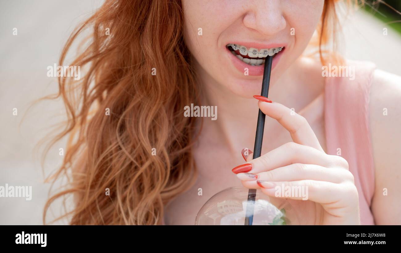 Pretty girl with braces and freckles hi-res stock photography and ...