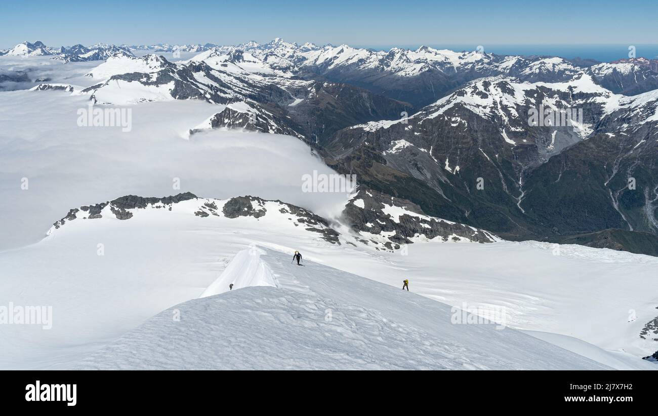 Climbers reaching the summit of Mt Aspiring Stock Photo - Alamy