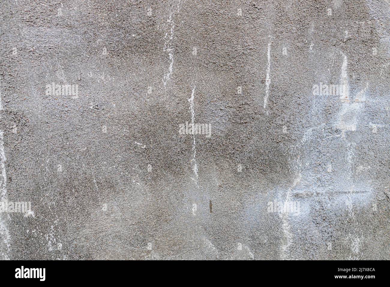 Peeling plaster on an old painted wall. texture background. Gray ...