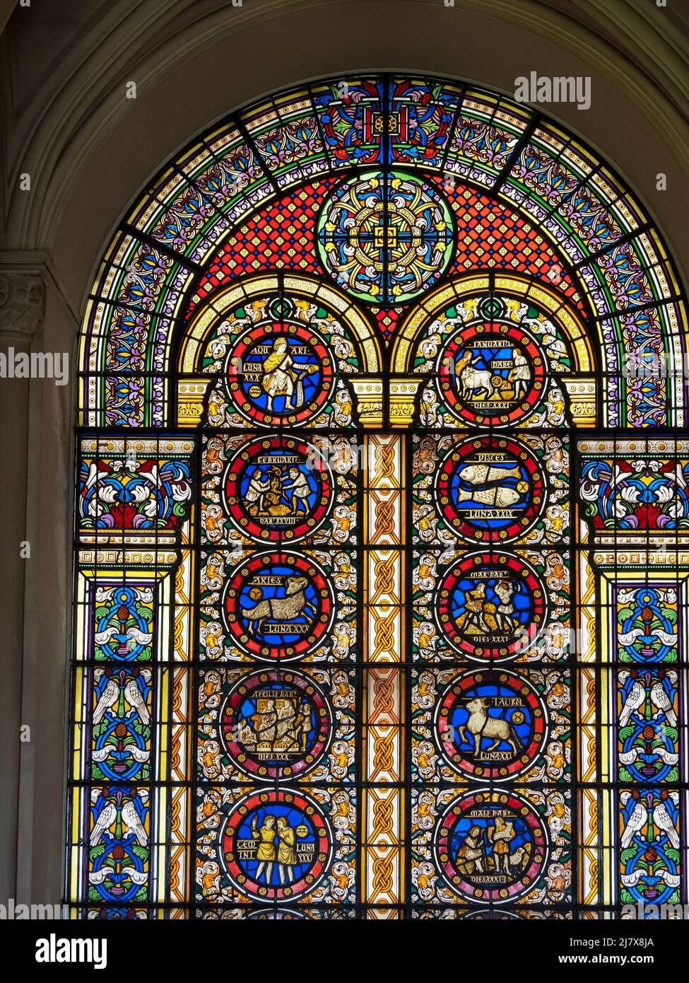 A Stained glass window depicting the star signs at Penrhyn Castle ...