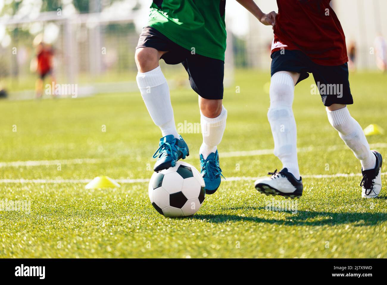 Two Kids Playing Football Ball on Grass Field. Happy School Boys ...