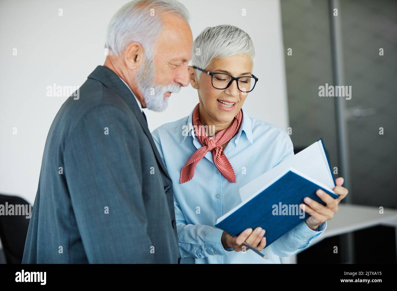 business office person discussion document teamwork teamwork senior ...