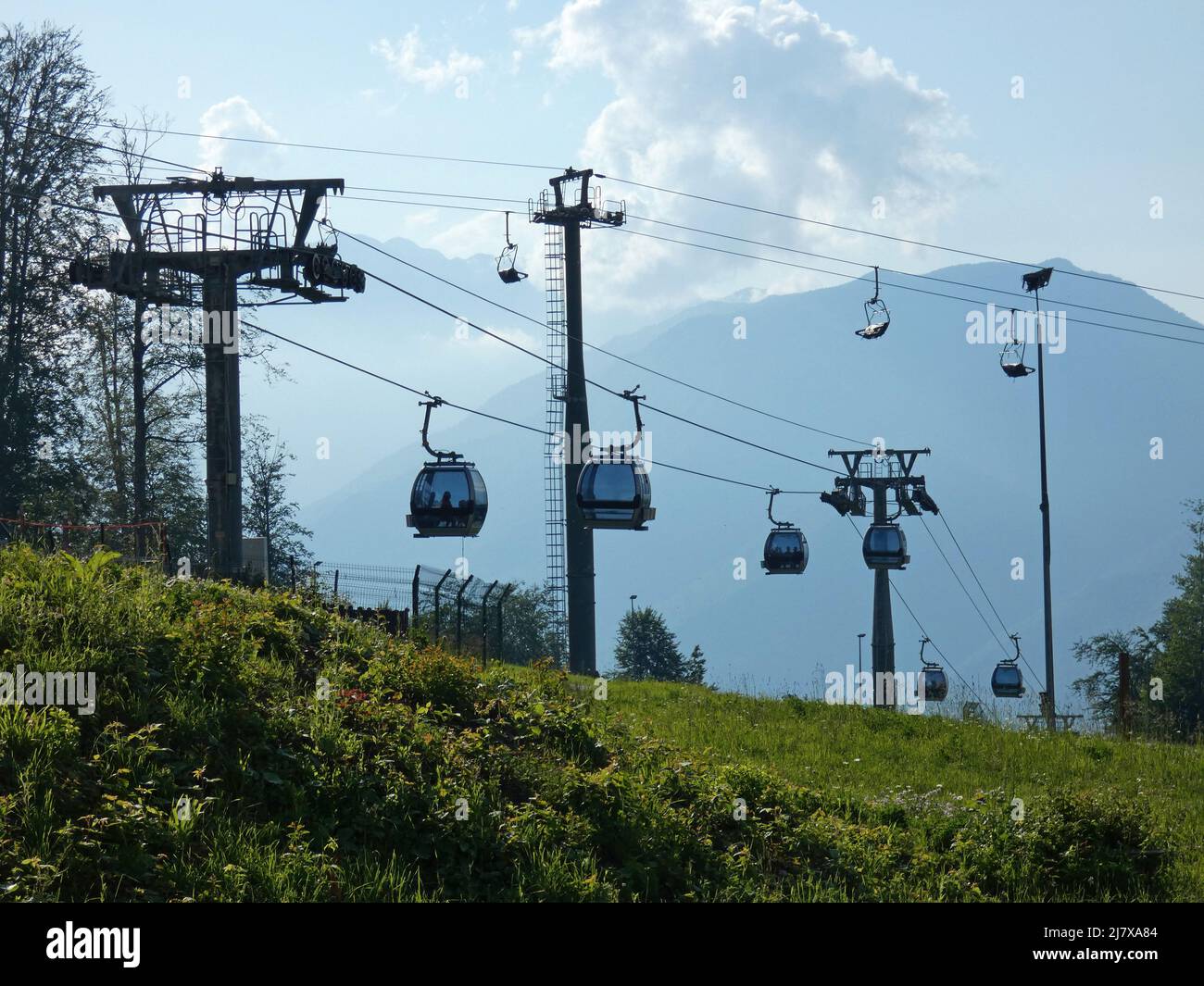 Cable way in mountains. Sunny summer day Stock Photo - Alamy
