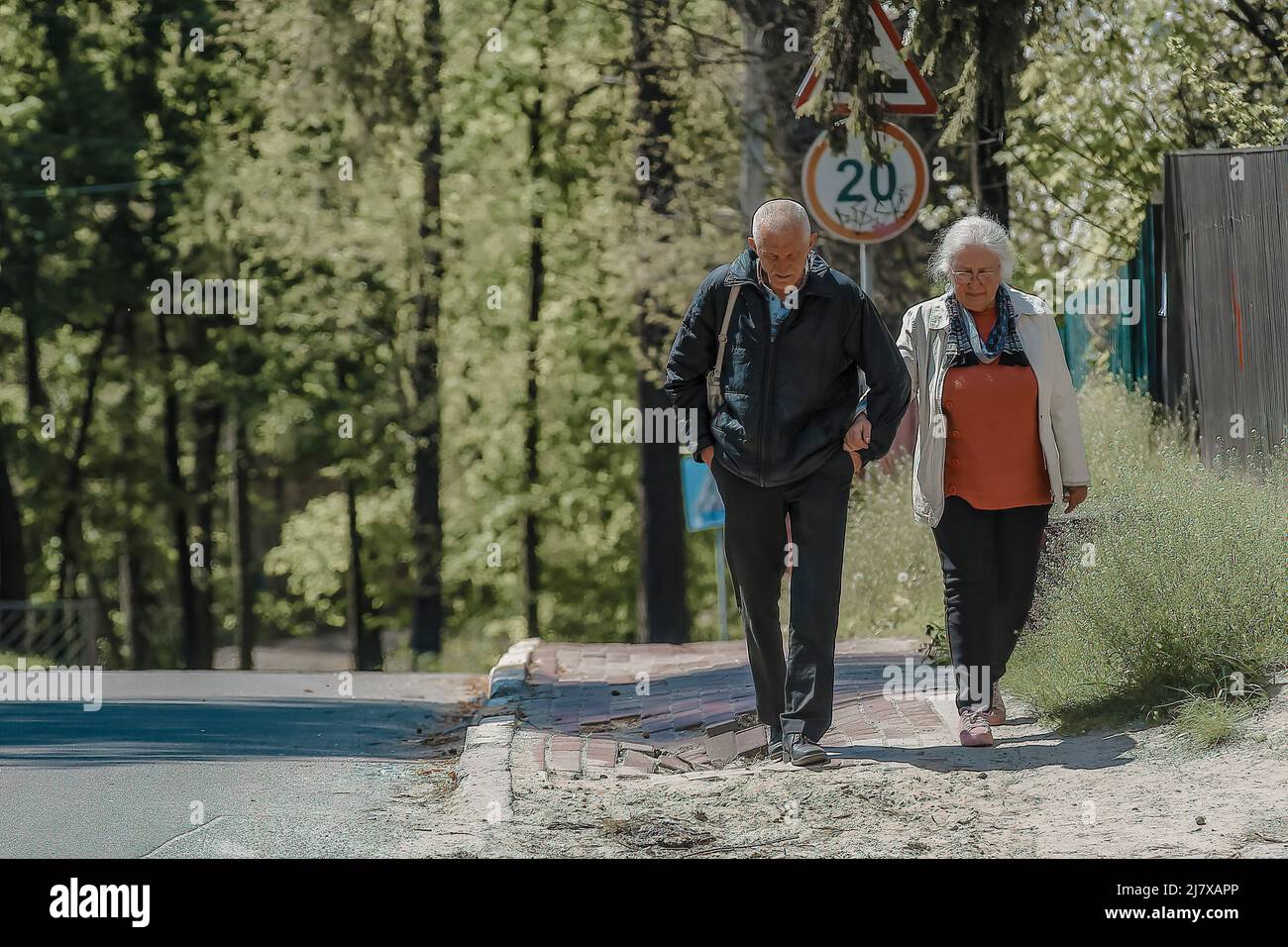 Bucha, Ukraine. 10th May, 2022. Local citizens walk in on one of the ...
