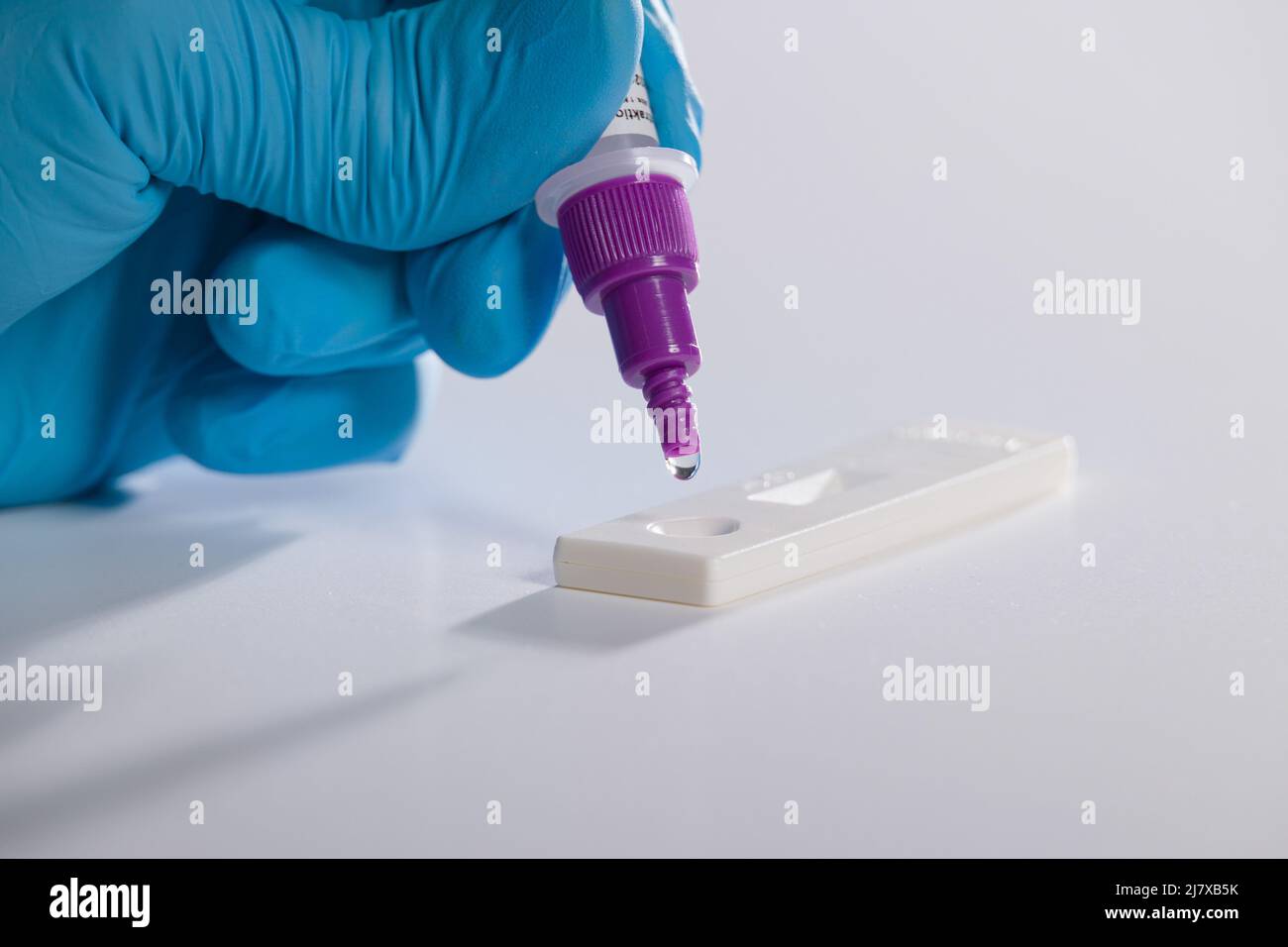 Close-up of preparing antigen self-test or quick test for Corona or ...