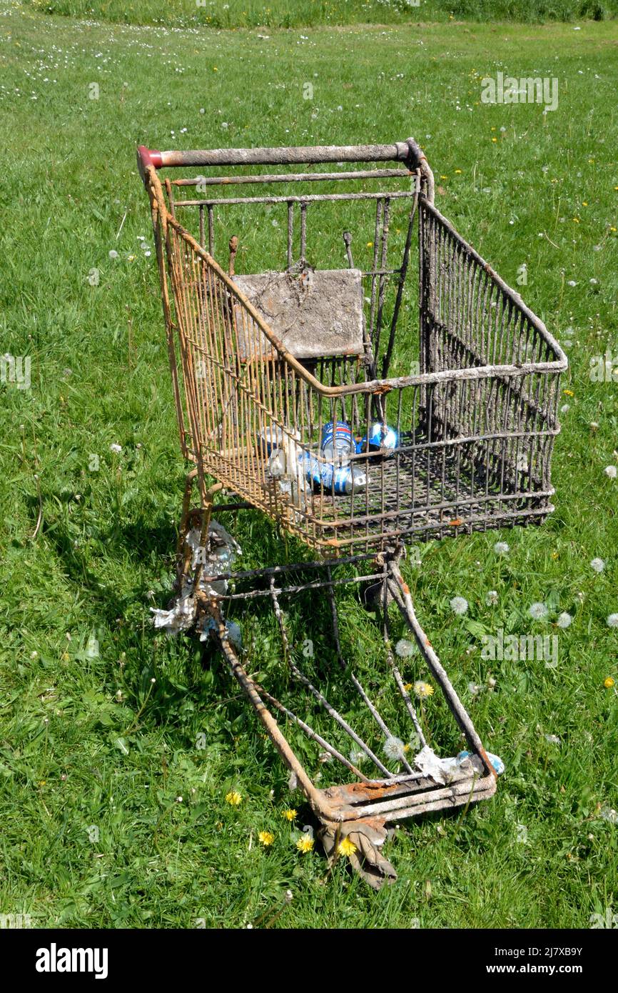 Corroded supermarket trolley after being recovered from a river Stock ...